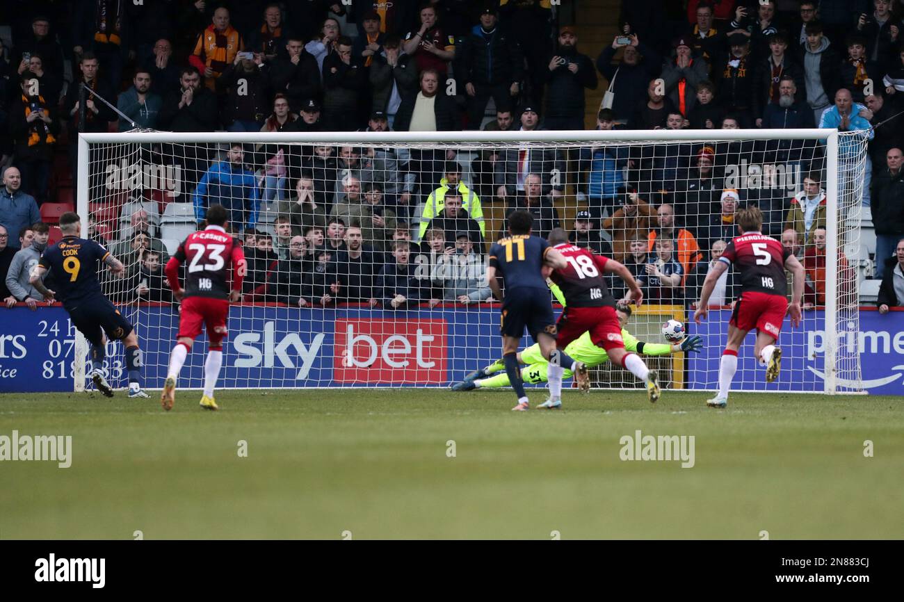 Bradford City's Andy Cook (left) scores their side's first goal of the ...