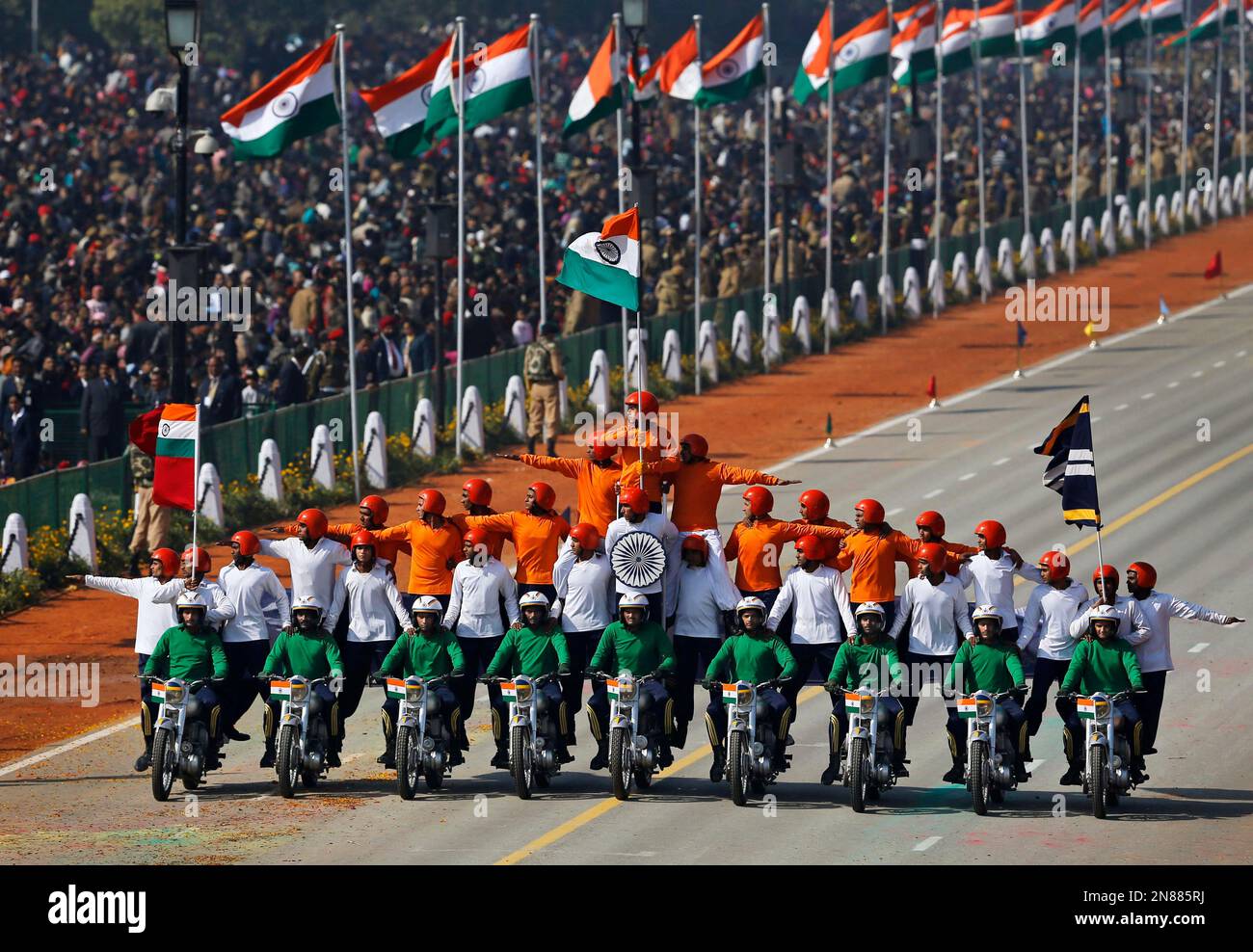 Indian military motorcycle stunt riders dressed in the color of the ...