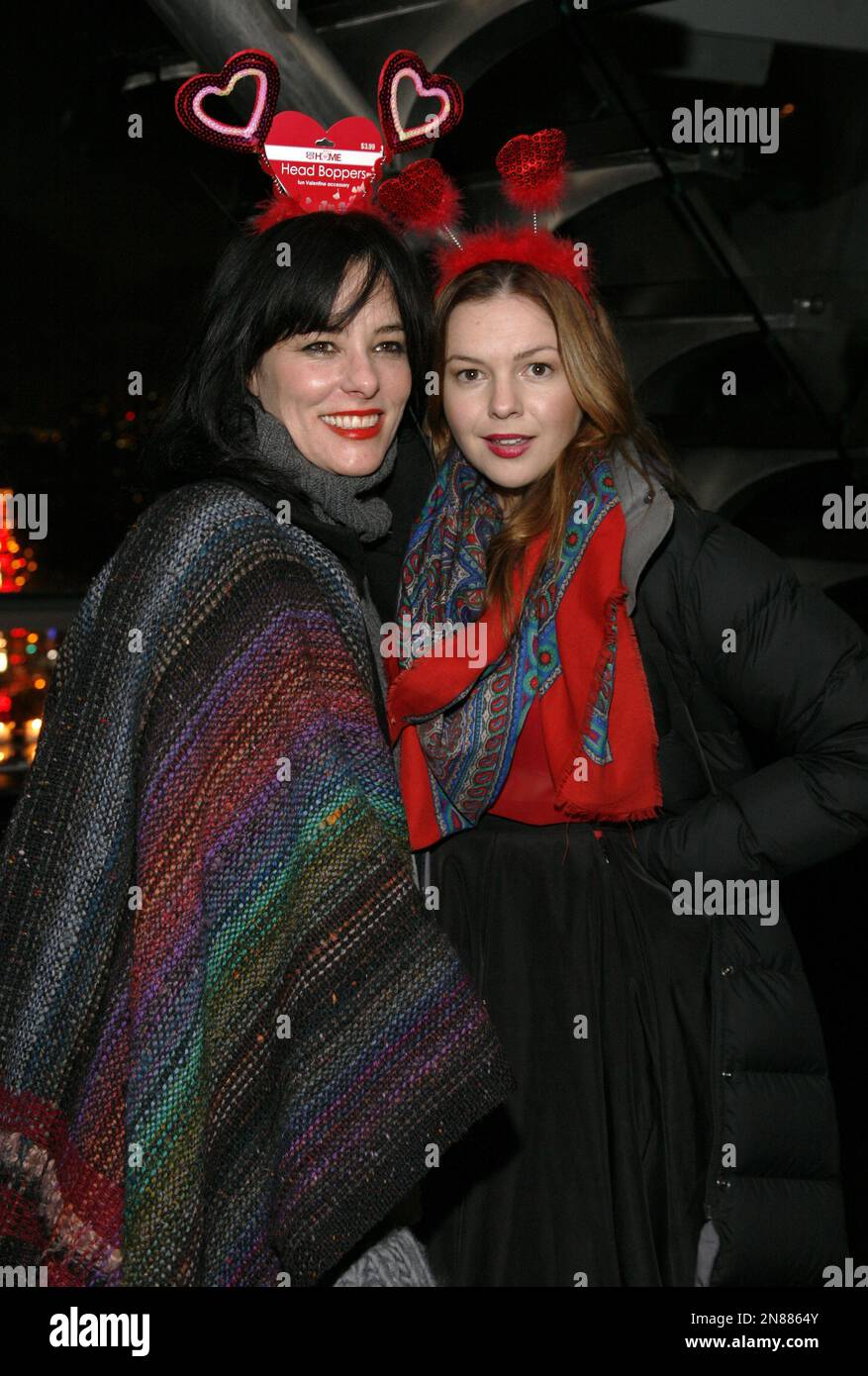 Actresses Parky Posey, left, and Amber Tamblyn, right, attend the "Warm ...