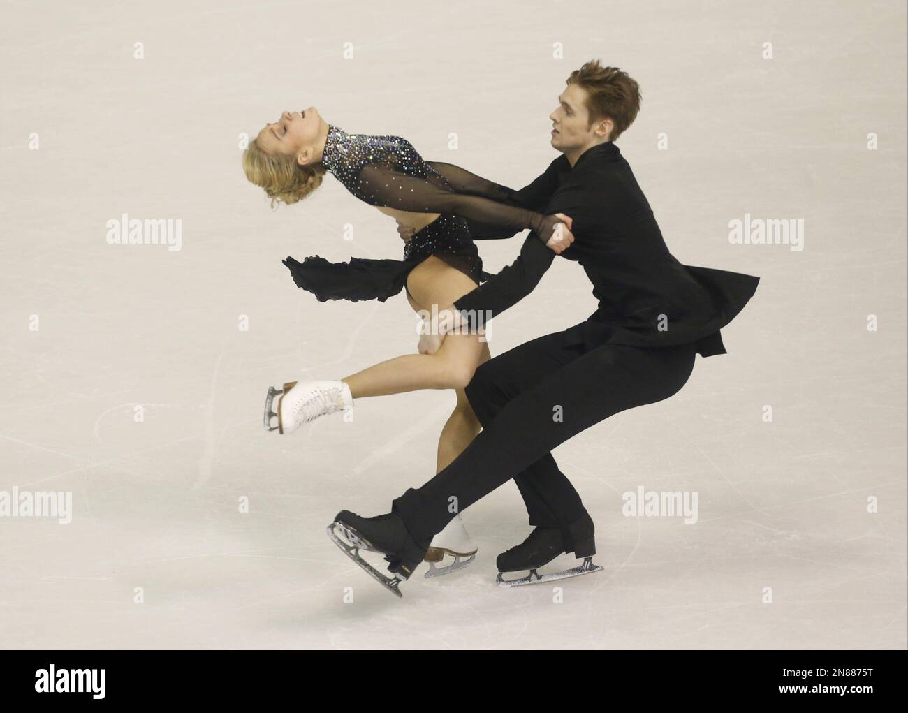 Pernelle Carron and Lloyd Jones, of France, skate their free dance at ...