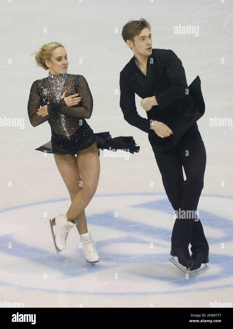 Pernelle Carron and Lloyd Jones, of France, skate their free dance at ...