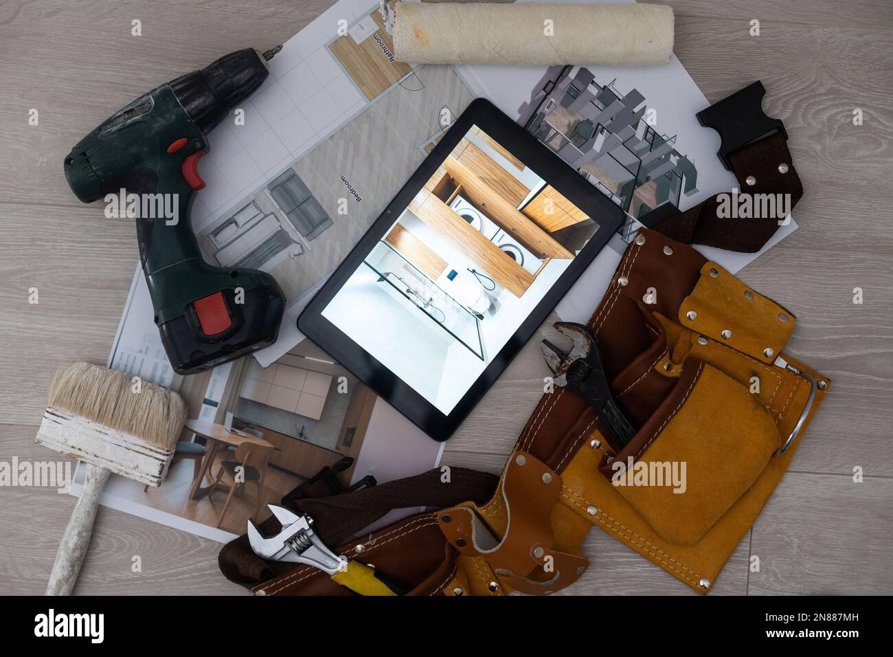 Tablet computer with architecture and construction tools and blueprints ...