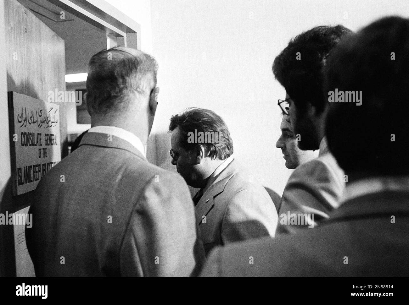Chicago FBI agents enter the Iranian consulate in Chicago, April 18 ...