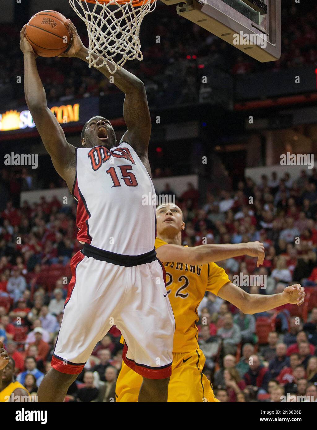 UNLV's Anthony Bennett (15) dunks against Wyoming's Larry Nance Jr. in ...