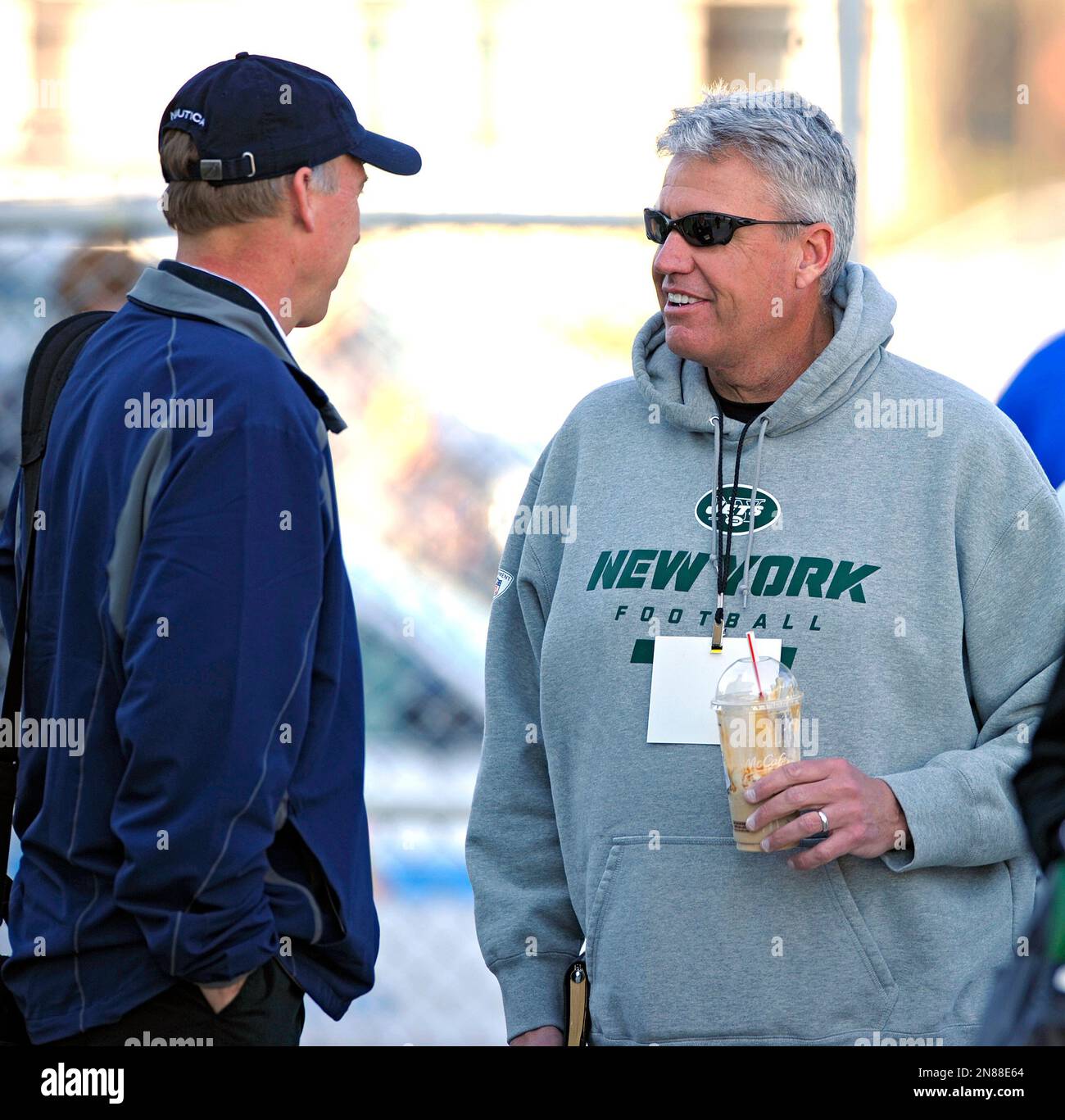 New York Jets head coach Rex Ryan, right, talks with Jets general ...