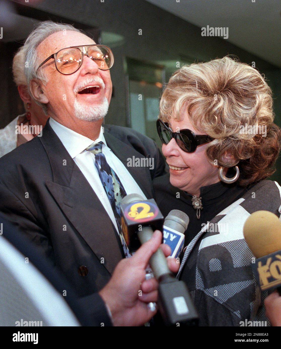 File -- In an April 25, 1997, file photo Burt Pugach laughs with his ...