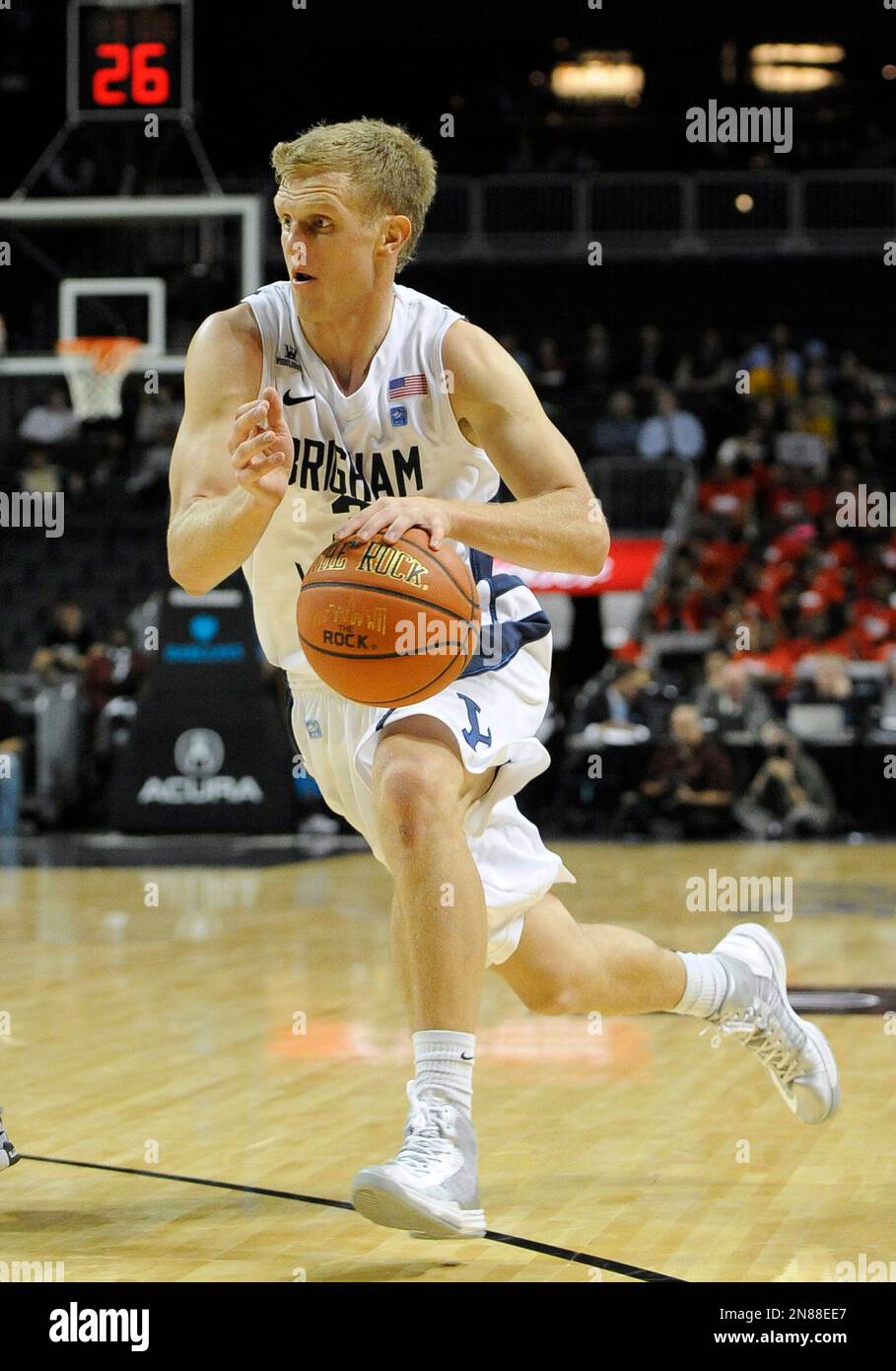 Brigham Young guard Tyler Haws (3) drives down court during the Coaches ...