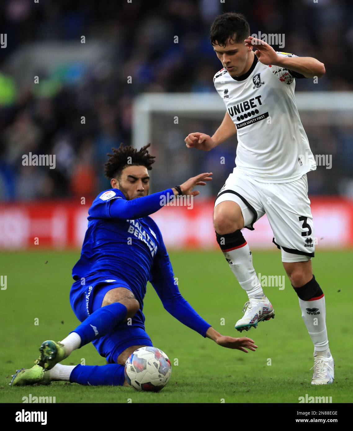Cardiff City's Kion Etete (left) challenges Middlesbrough's Ryan Giles ...