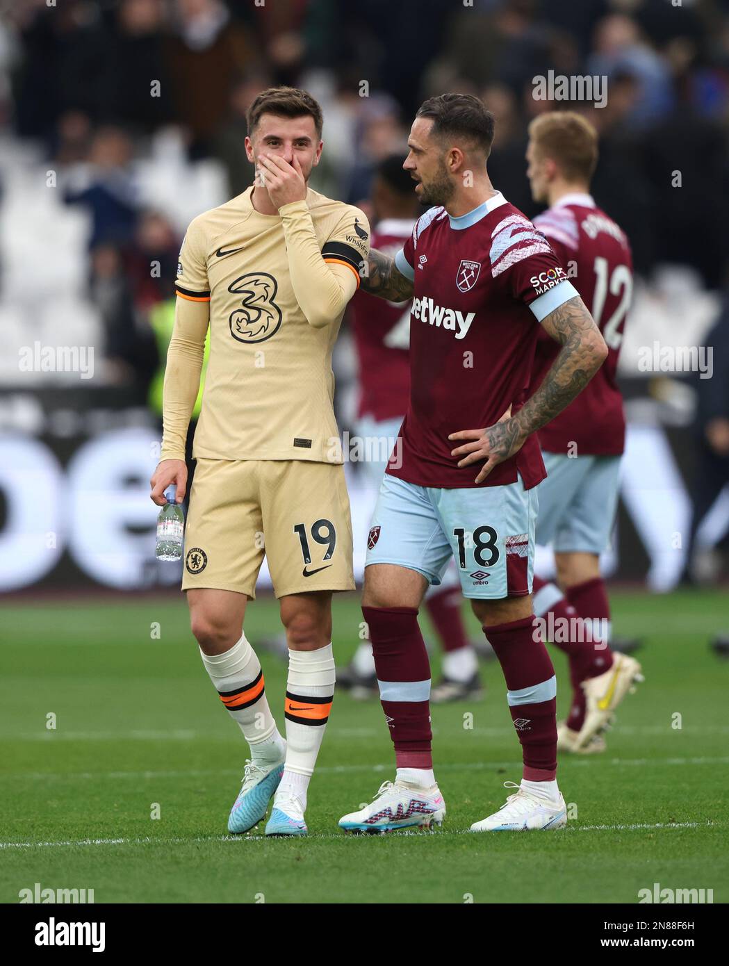 London, UK. 11th Feb, 2023. Mason Mount (C) and Danny Ings (WHU) at the ...