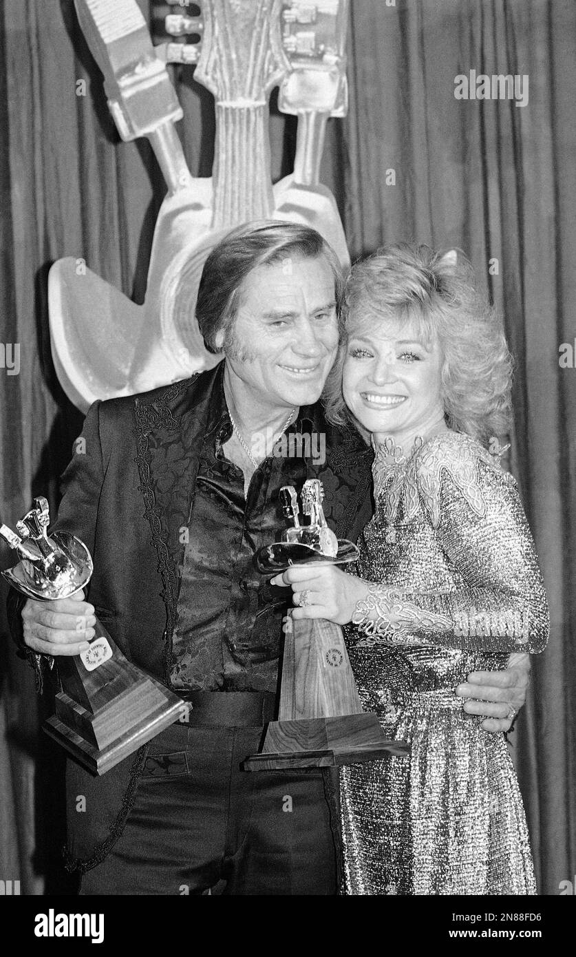 Singer George Jones, left, winner of three Country Music Awards, hugs ...