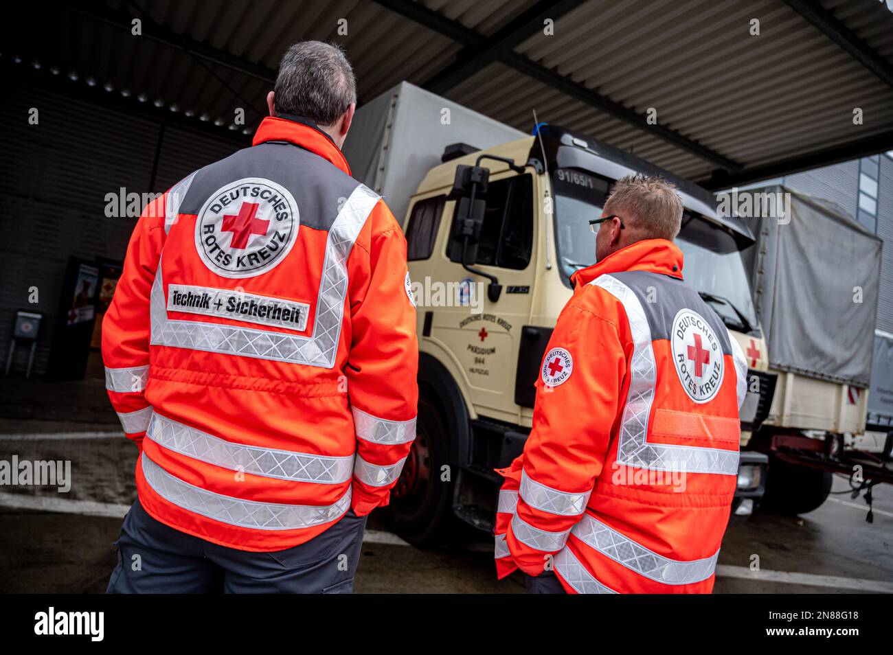 11 February 2023, Brandenburg, Schönefeld: Two people from the German ...