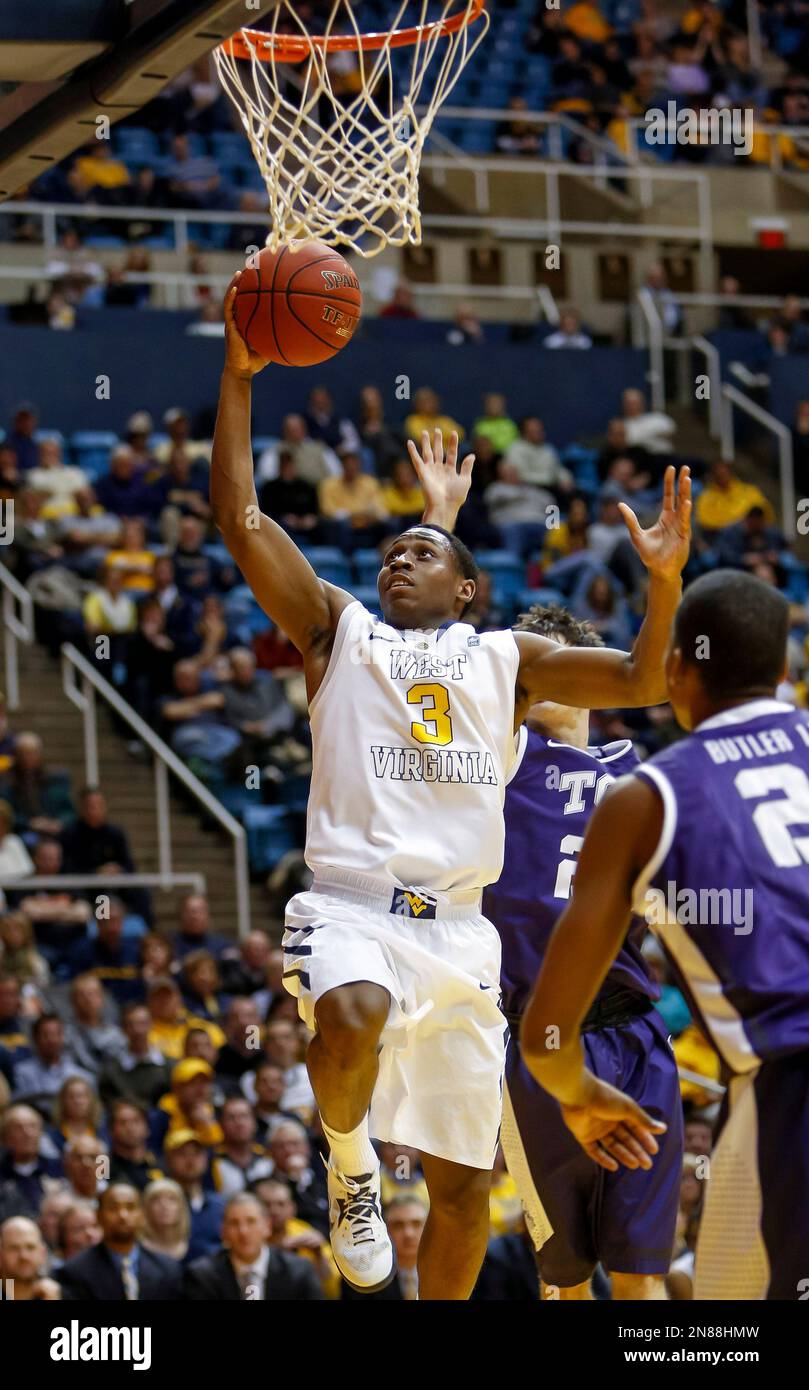 West Virginia's Juwan Staten (3) goes in for a layup against TCU during ... West Virginia's Juwan Staten (3) goes in for a layup against TCU during ...