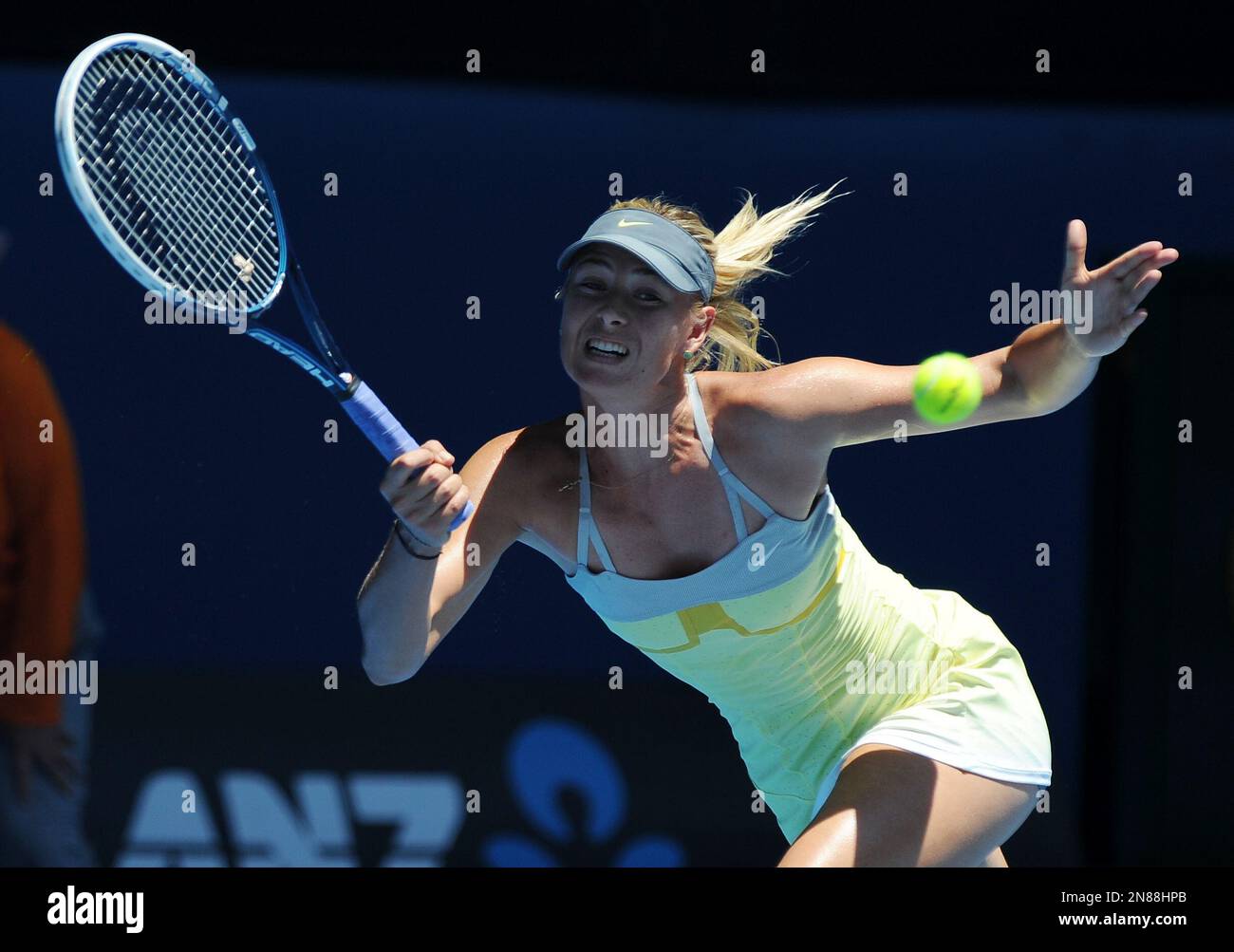 Russia's Maria Sharapova hits a forehand return to China's Li Na during ...