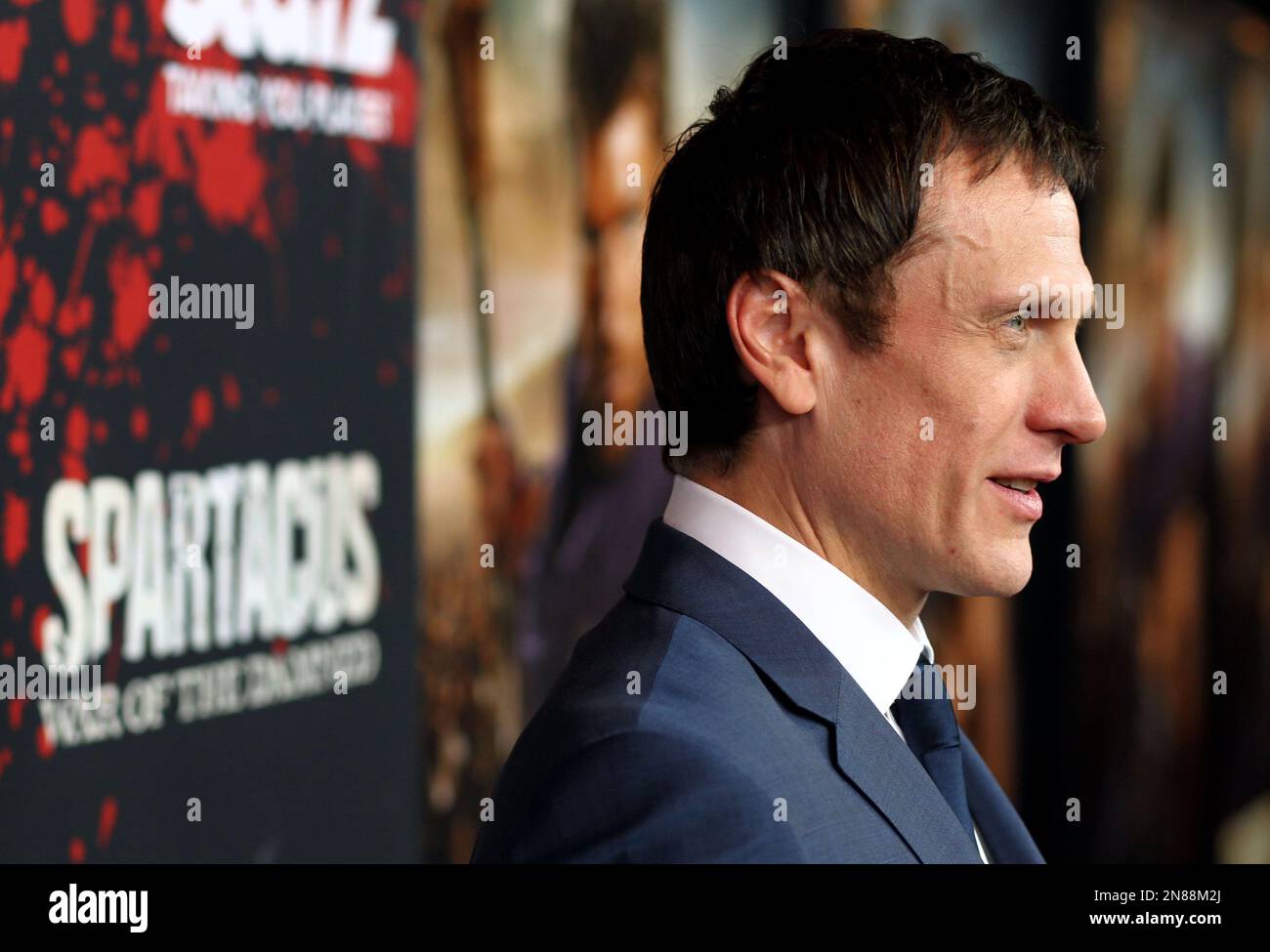 Simon Merrells arrives at the premiere of "Spartacus: War of the Damned ...