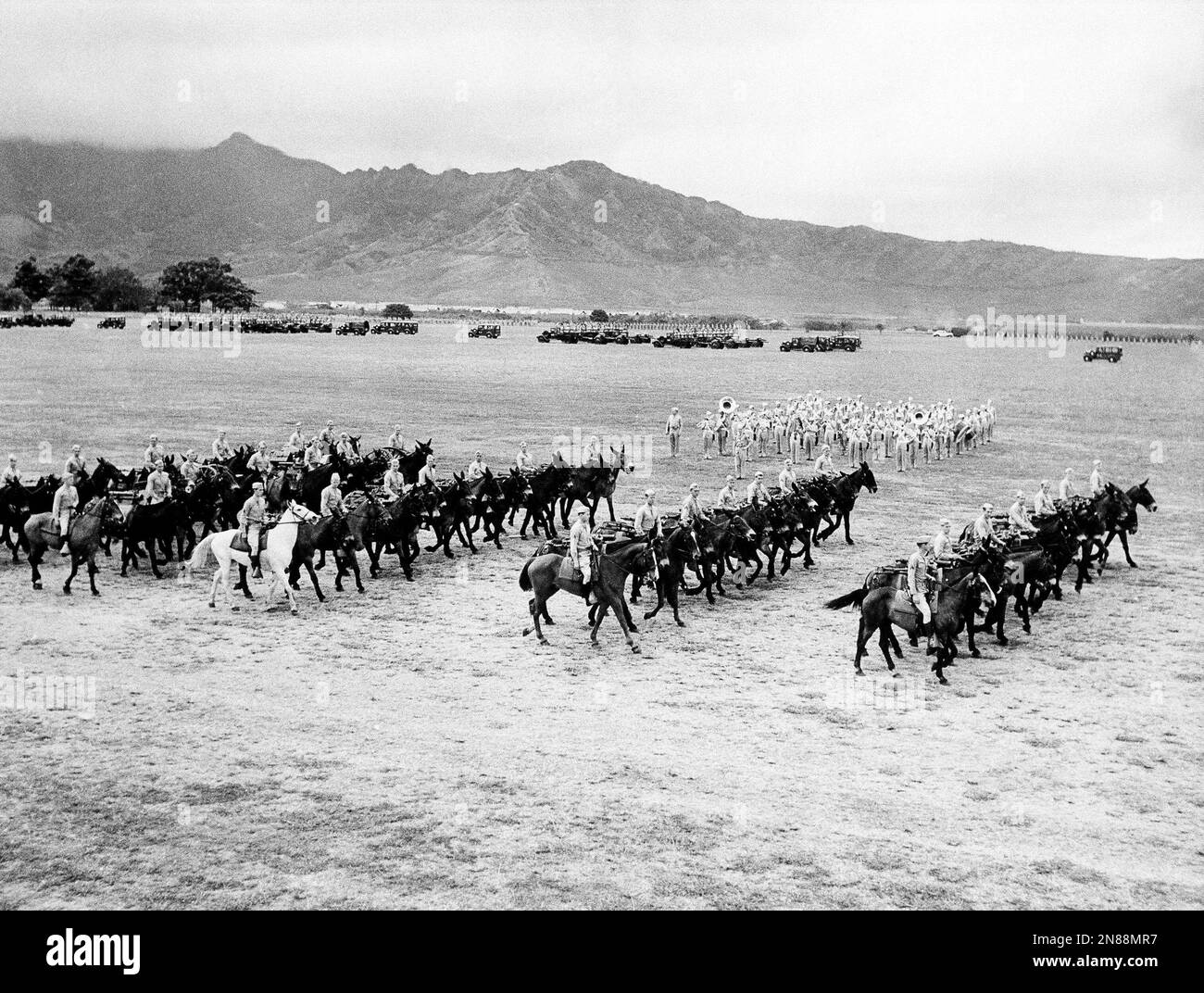 A portion of the cavalry section of the Army's Hawaii division honors ...