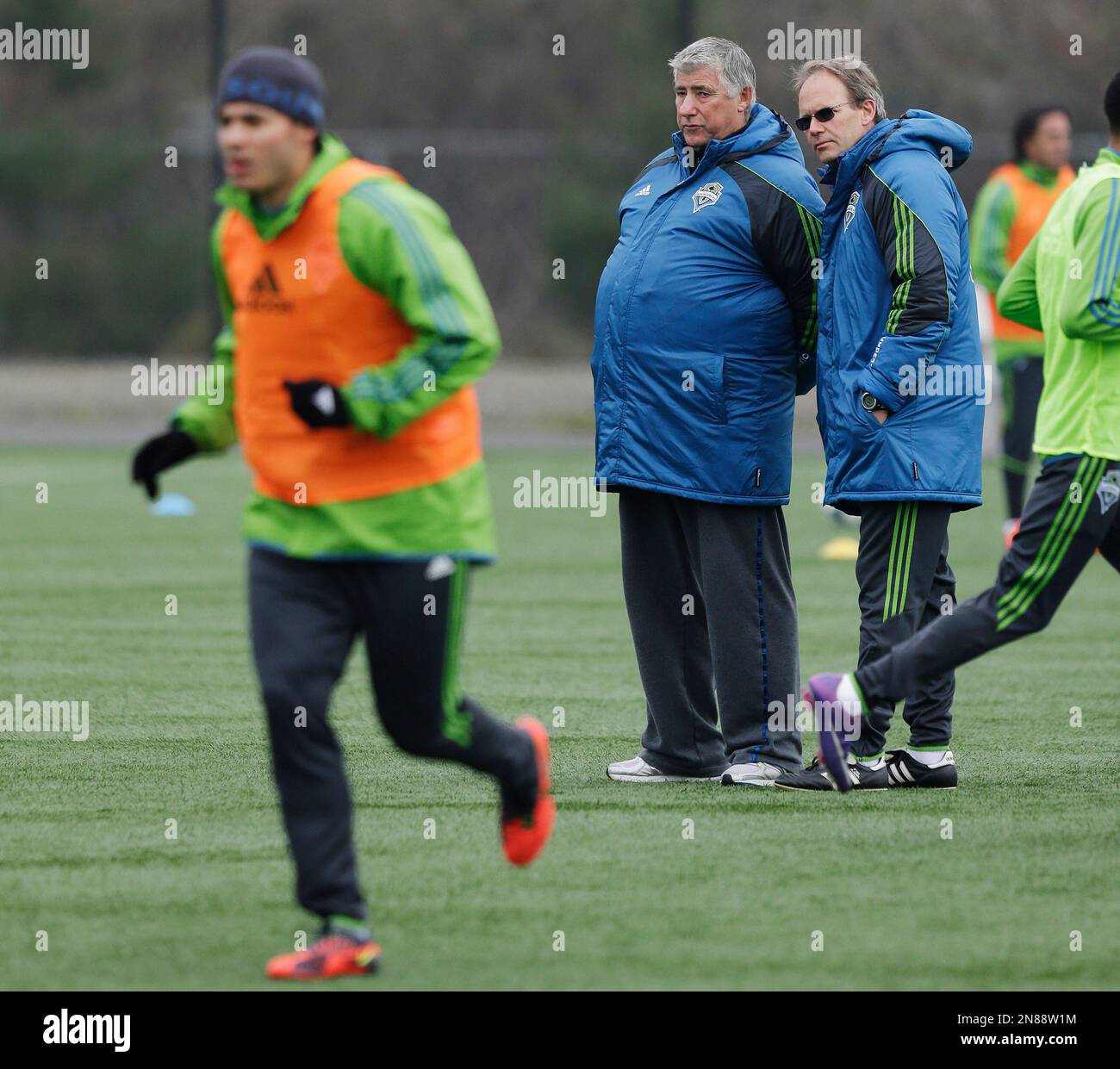 Seattle Sounders head coach Sigi Schmid, second from left, and ...