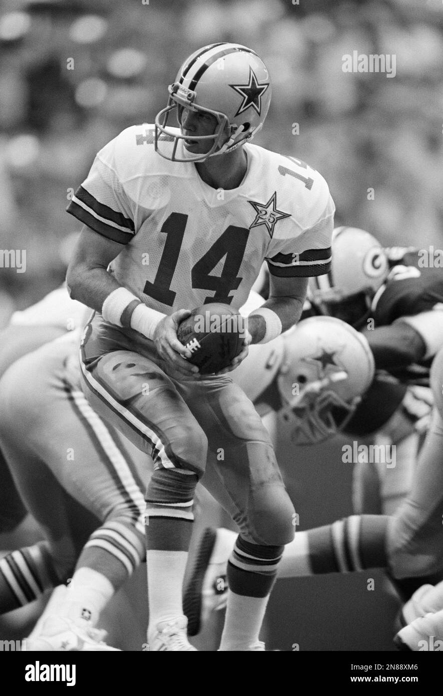 Dallas Cowboys quarterback Gary Hogeboom moves away from the line after ...