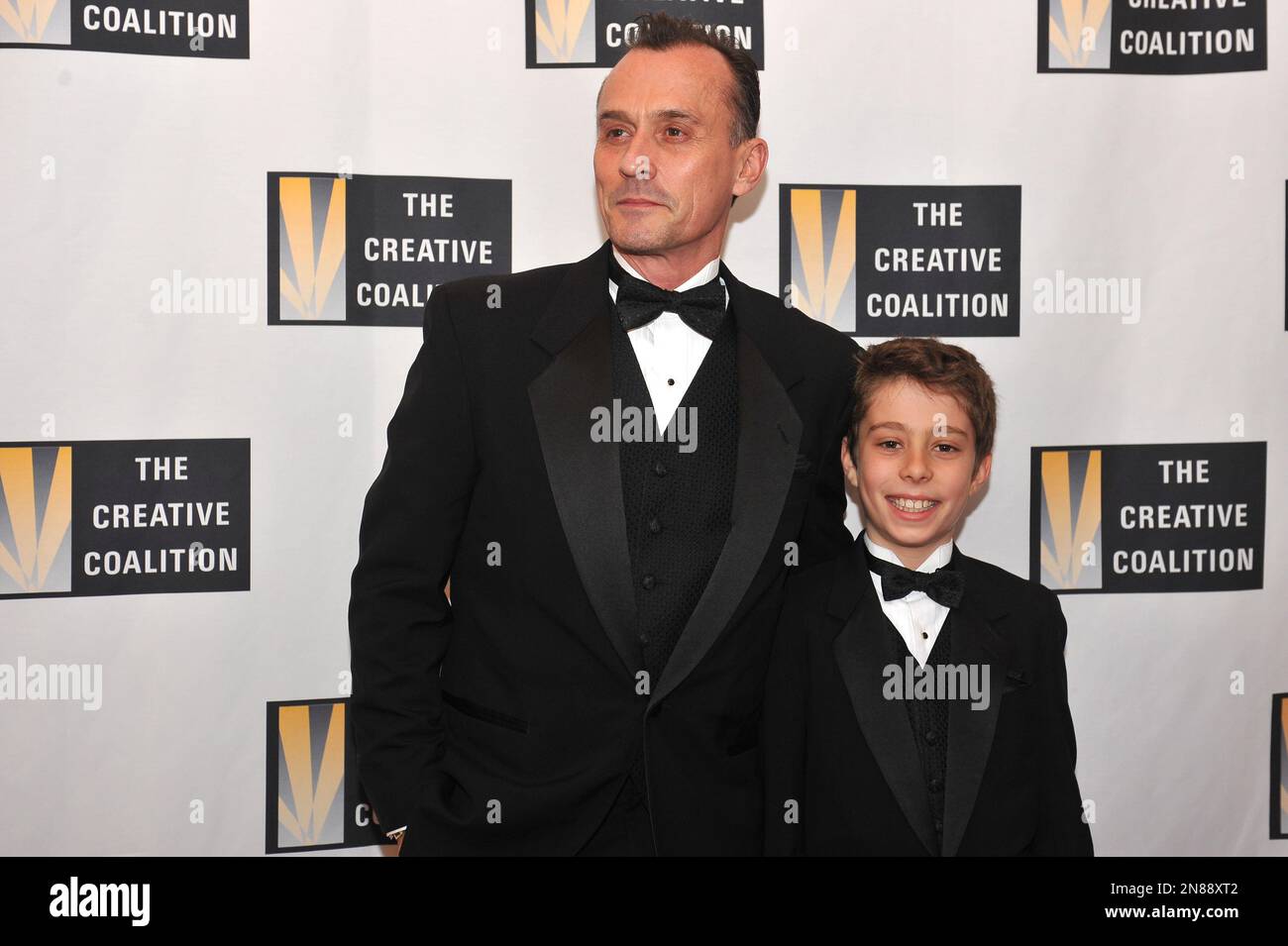 Robert Knepper, left, and son, Ben, arrive at the Creative Coalition ...