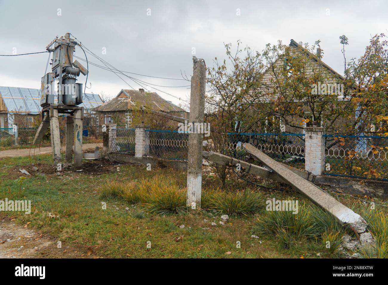 Countryside. Electrical transformer damaged by shelling. War in Ukraine. Destruction of ...