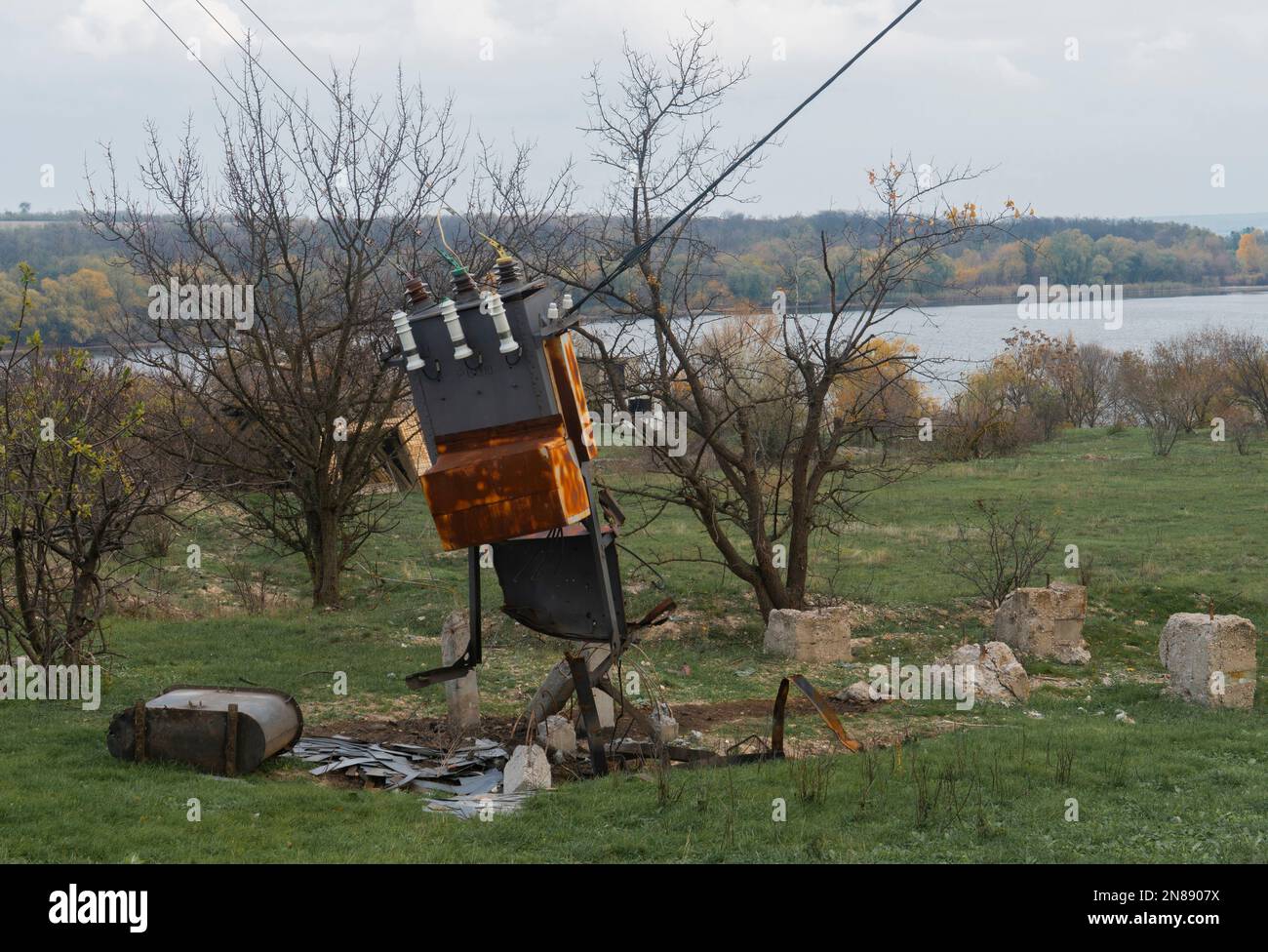 Countryside. An electrical transformer damaged by shelling. War in ...