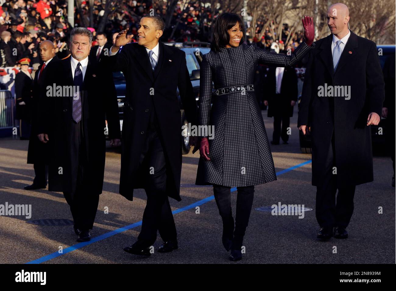 President Barack Obama and first lady Michelle Obama walk in the ...