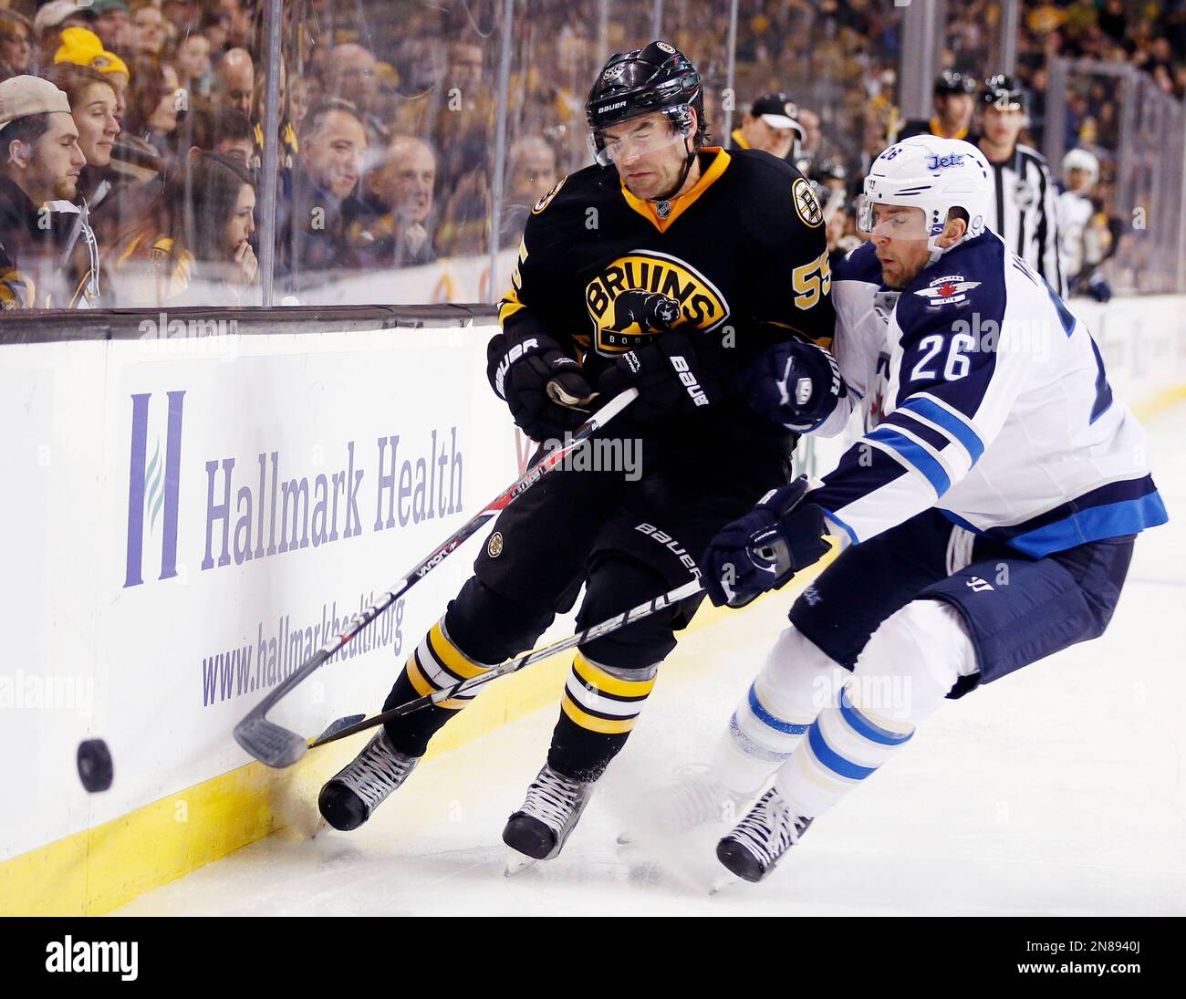 Boston Bruins' Johnny Boychuk (55) and Winnipeg Jets' Blake Wheeler (26 ...