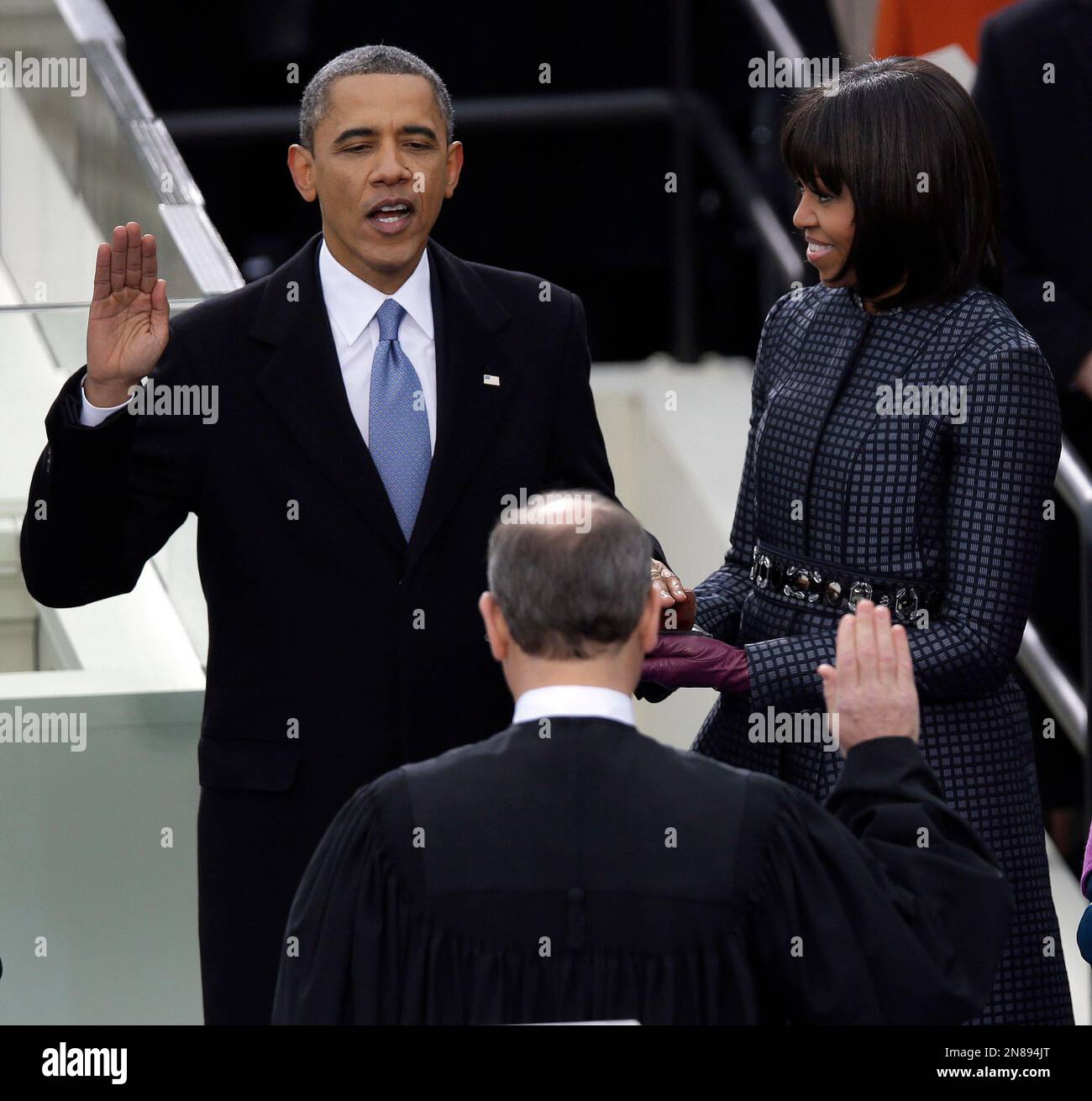 President Barack Obama receives the oath of office from Chief Justice ...