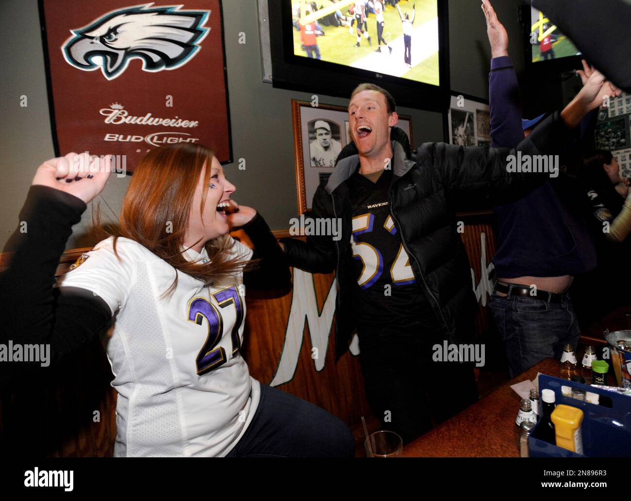 Baltimore Ravens fans Megan Royer, left, and Kit Taylor react while ...