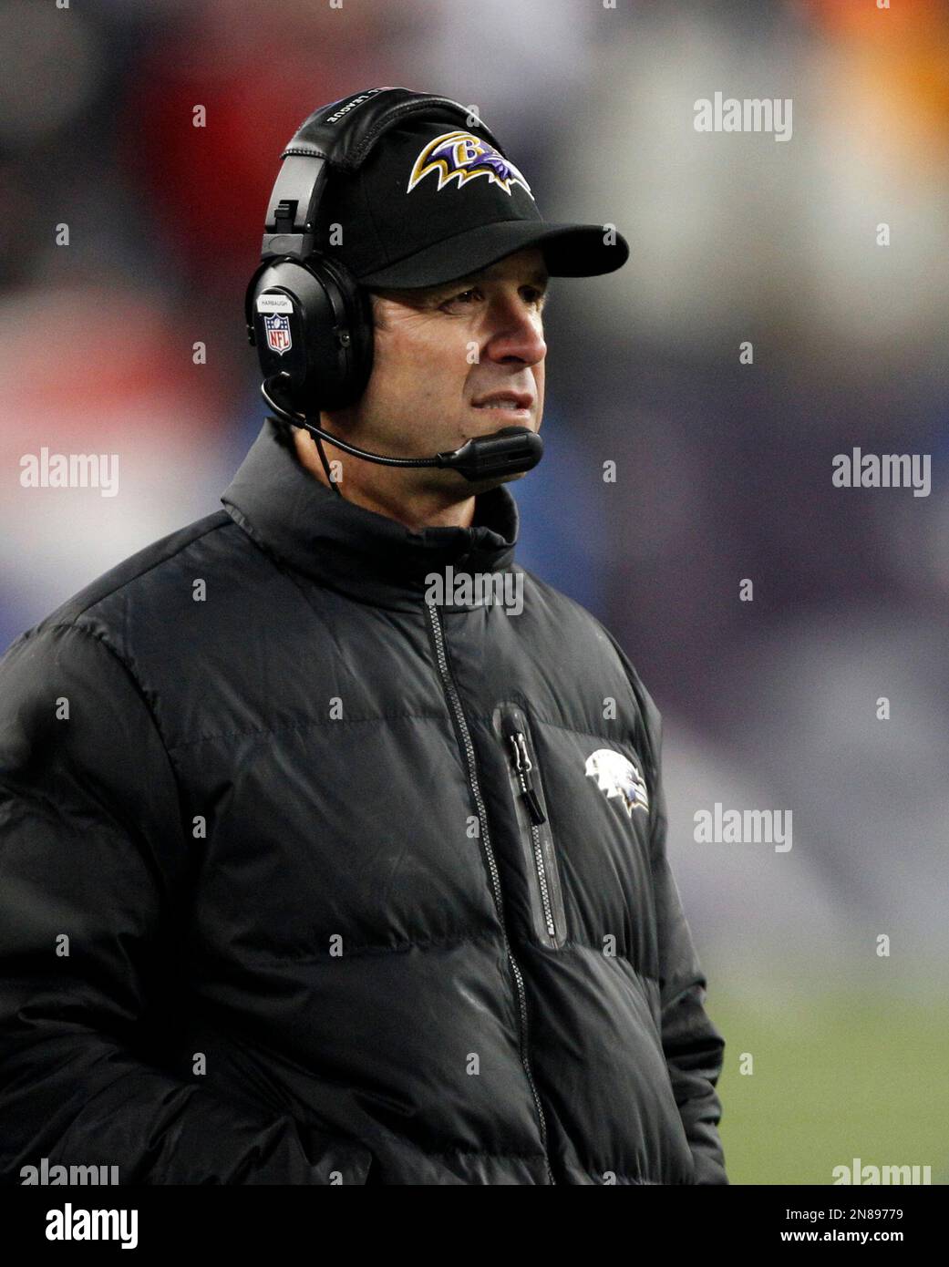 Baltimore Ravens head coach John Harbaugh watches his team during the ...