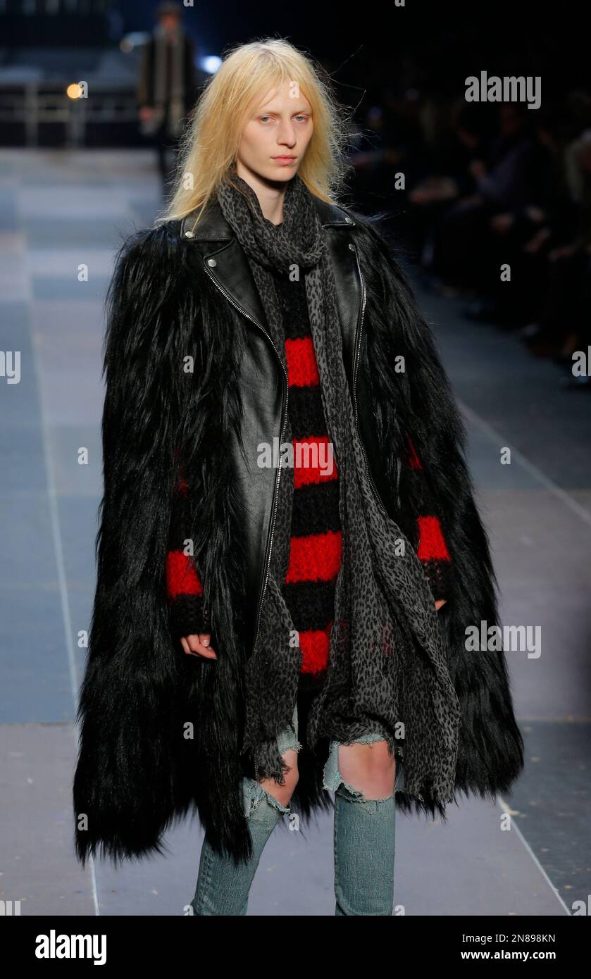 A model wears a creation by Born French fashion designer Hedi Slimane ...