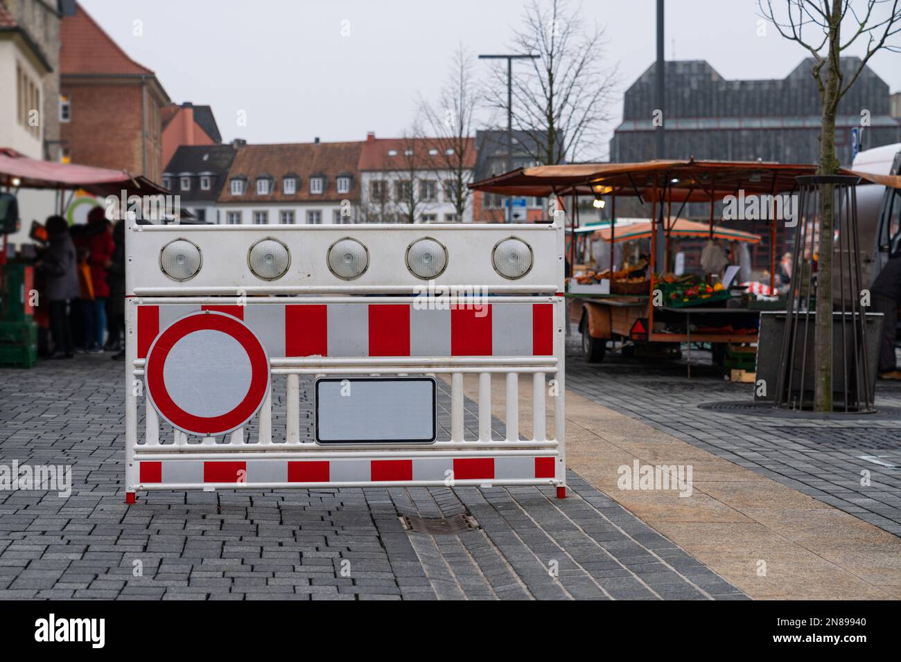 Portable plastic red and white barrier with a stop signal fume ...