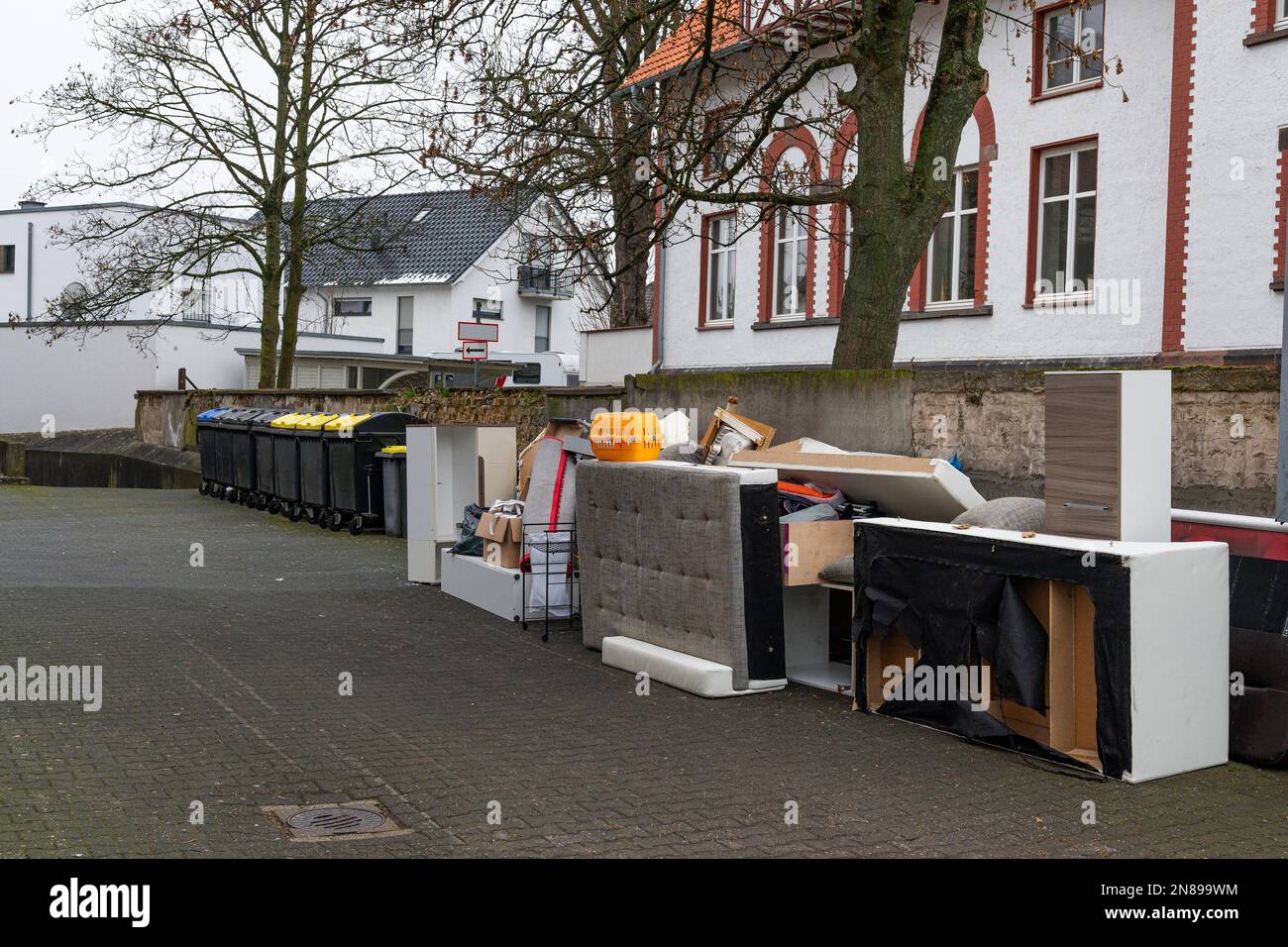 Old damaged furniture on street outside house for transportation to a ...