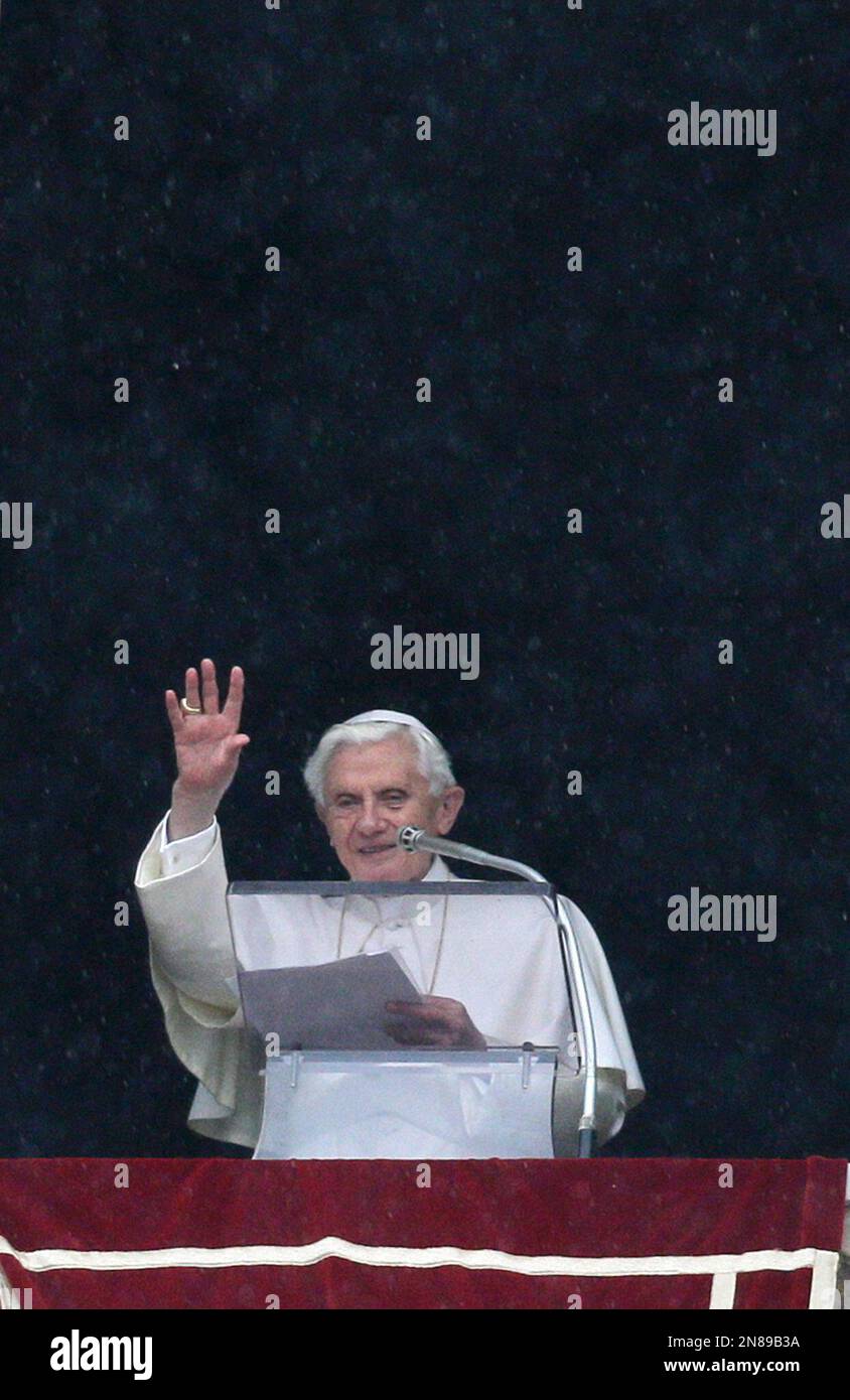 Pope Benedict XVI blesses faithful on a rainy day during the Angelus ...