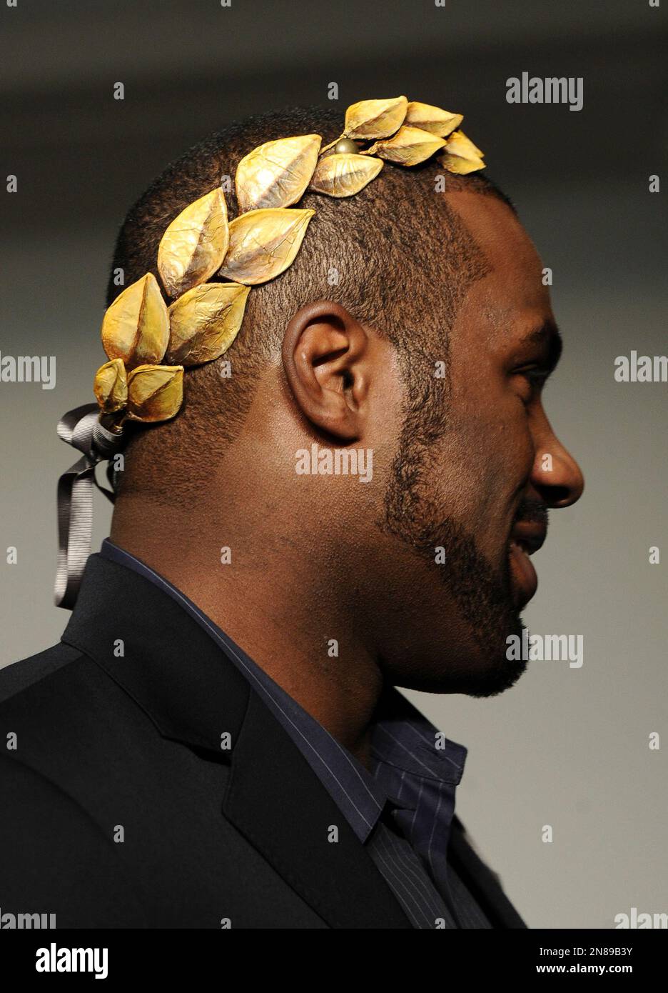 French judo Olympic and world champion Teddy Riner wears a crown as he ...