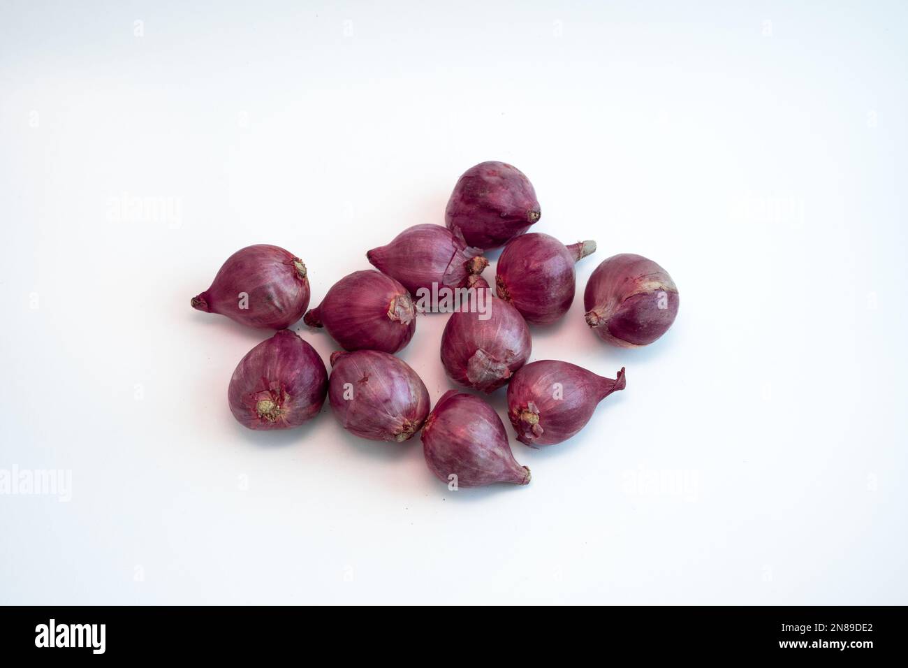 Shallots isolated on white background. Important ingredient used in ...