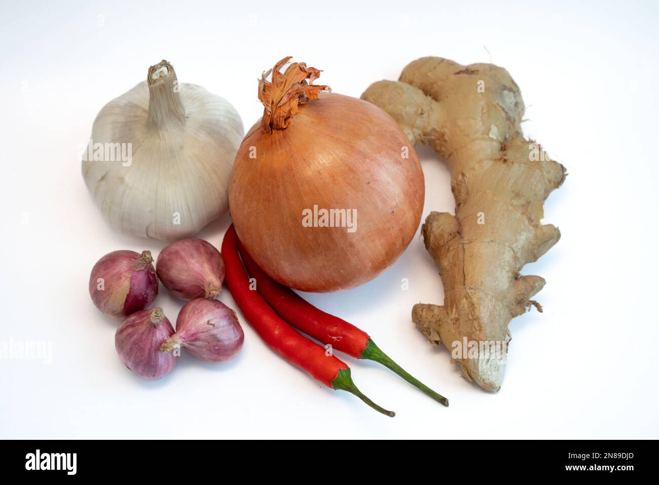 Chili pepper, onion , shallot, ginger and garlic isolated on white ...