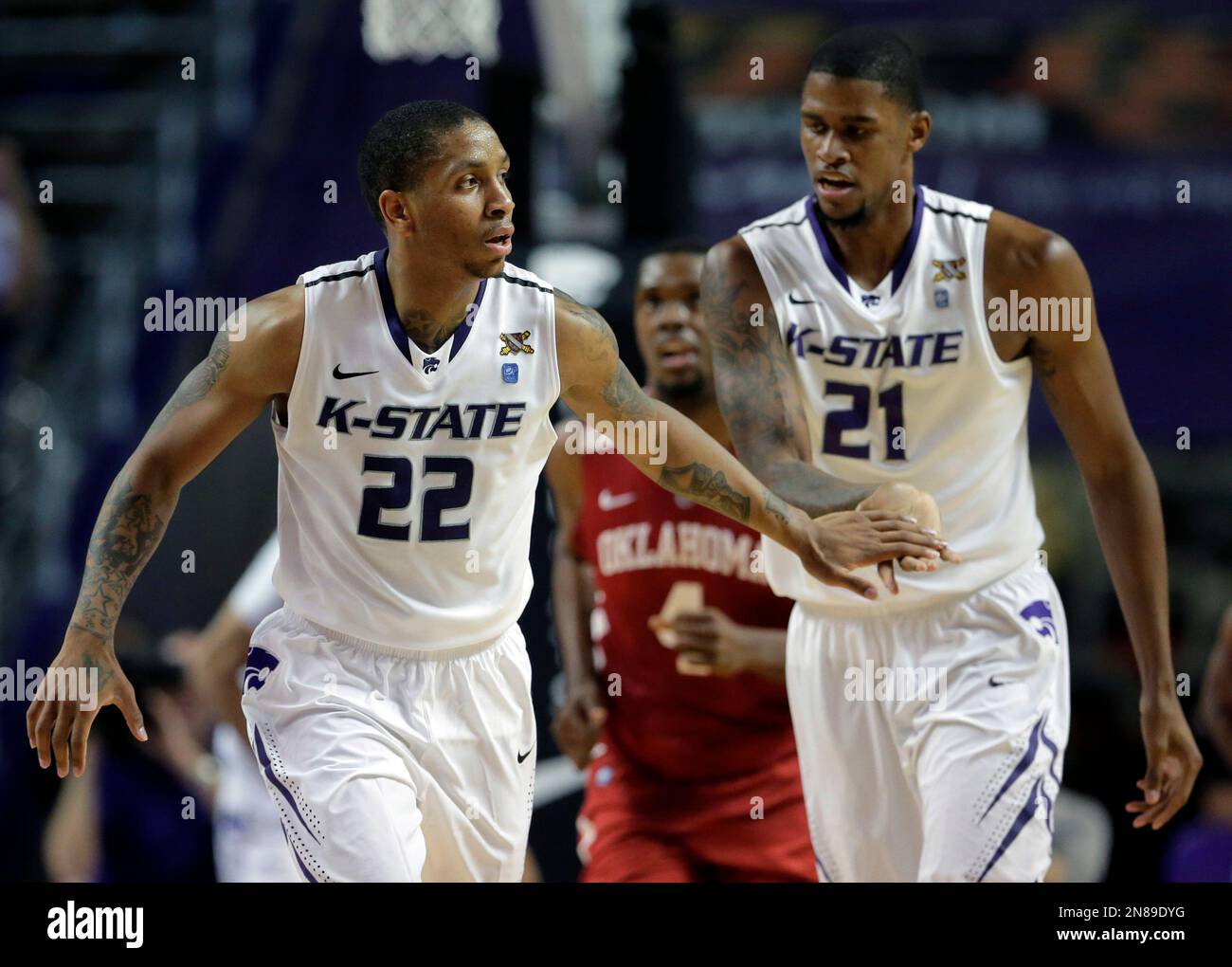 Kansas State guard Rodney McGruder (22) and forward Jordan Henriquez ...
