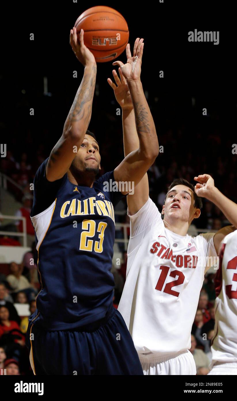 California 's Allen Crabbe (23) shoots next to Stanford 's Rosco Allen ...