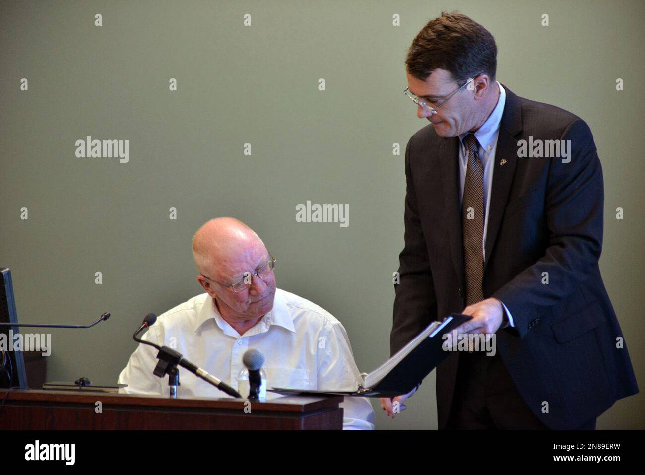 Edward Allen Brown, center, is cross examined by Defense attorney Eric ...