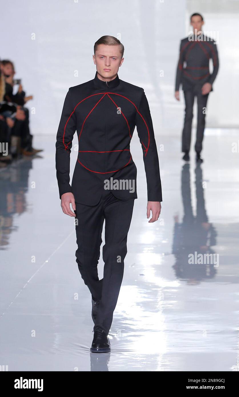 A model wears a creation by Belgian fashion designer Kris Van Assche ...