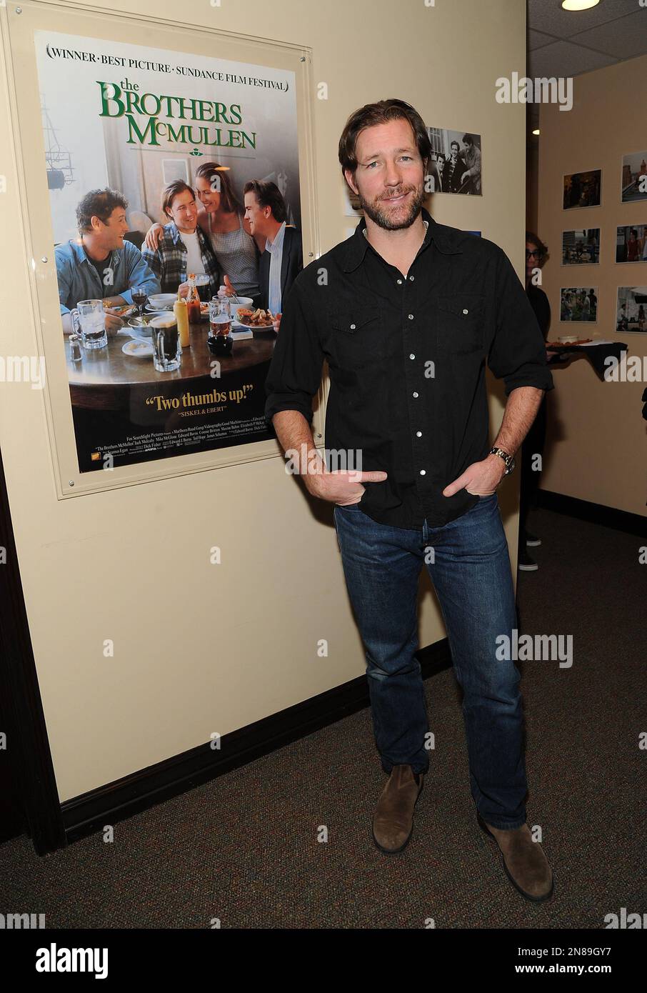 Filmmaker Ed Burns poses in front of a poster for his first film "The ...
