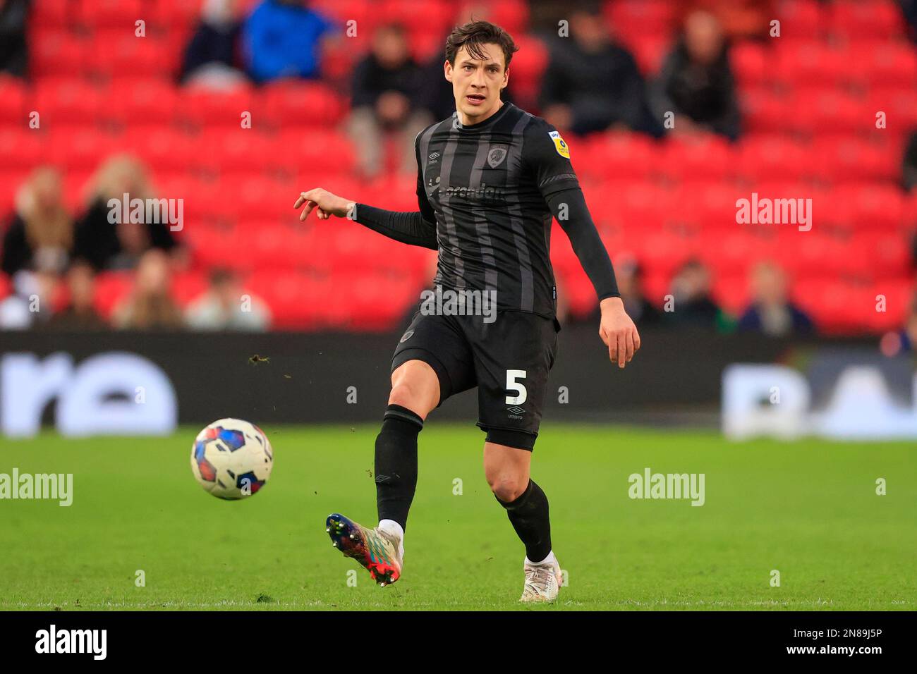 Alfie Jones #5 of Hull City passes the ball during the Sky Bet ...