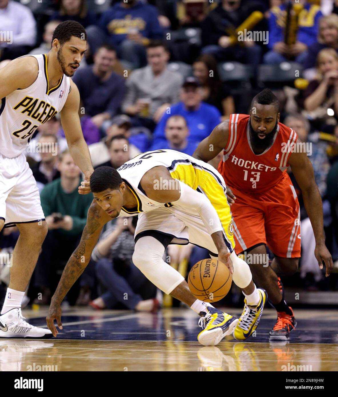 Indiana Pacers' Paul George (24) makes a steal in front of Jeff ...