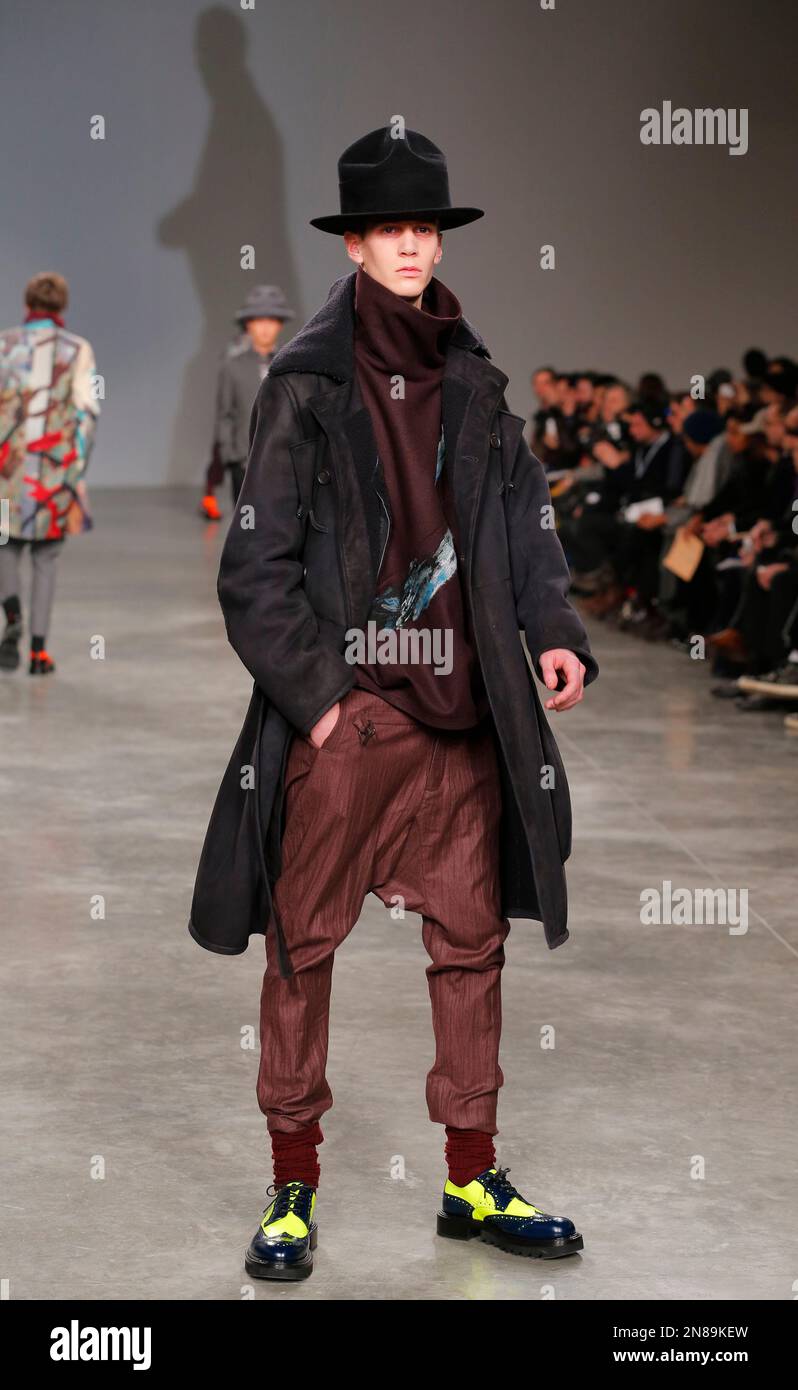 A model wears a creation by British fashion designer Bill Gaytten for ...