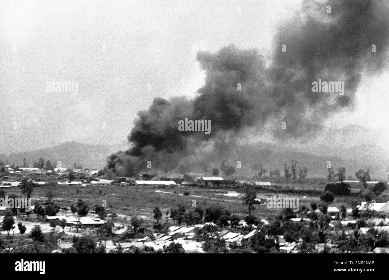 Smoke and dust rise from bombs dropped by U.S. B52's on May 19, 1972 ...