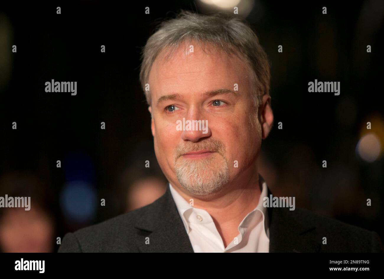 Director David Fincher arrives on the red carpet for the Netflix UK ...
