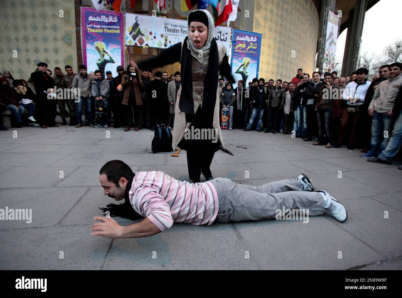 Iranian actress Elaheh Pourjamshid, top, and actor Mohammad Hadi Ataei ...