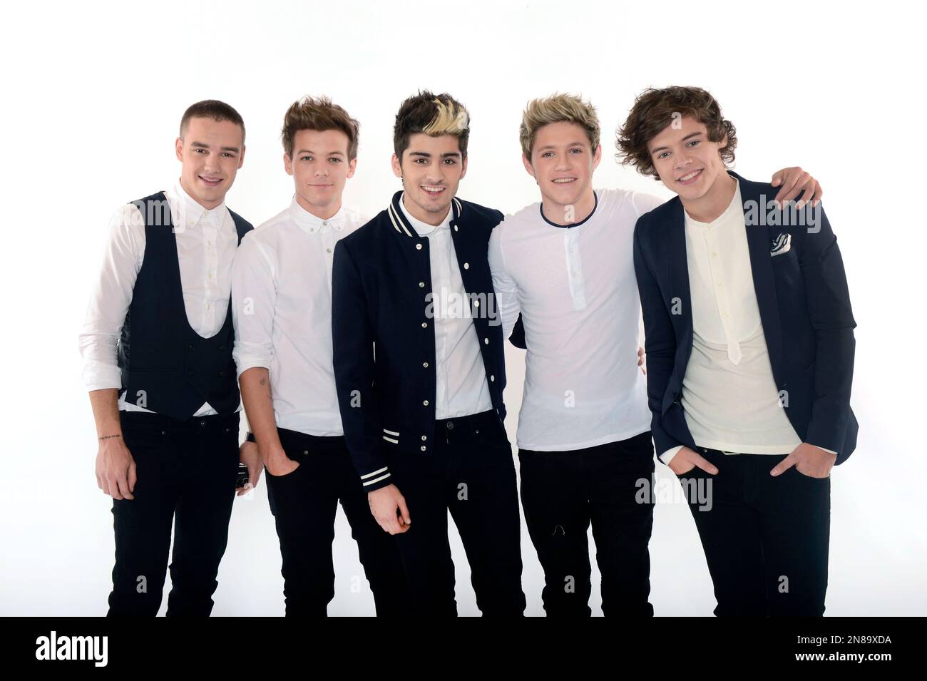 Boy band One Direction, from left, Liam Payne, Louis Tomlinson, Zayn ...