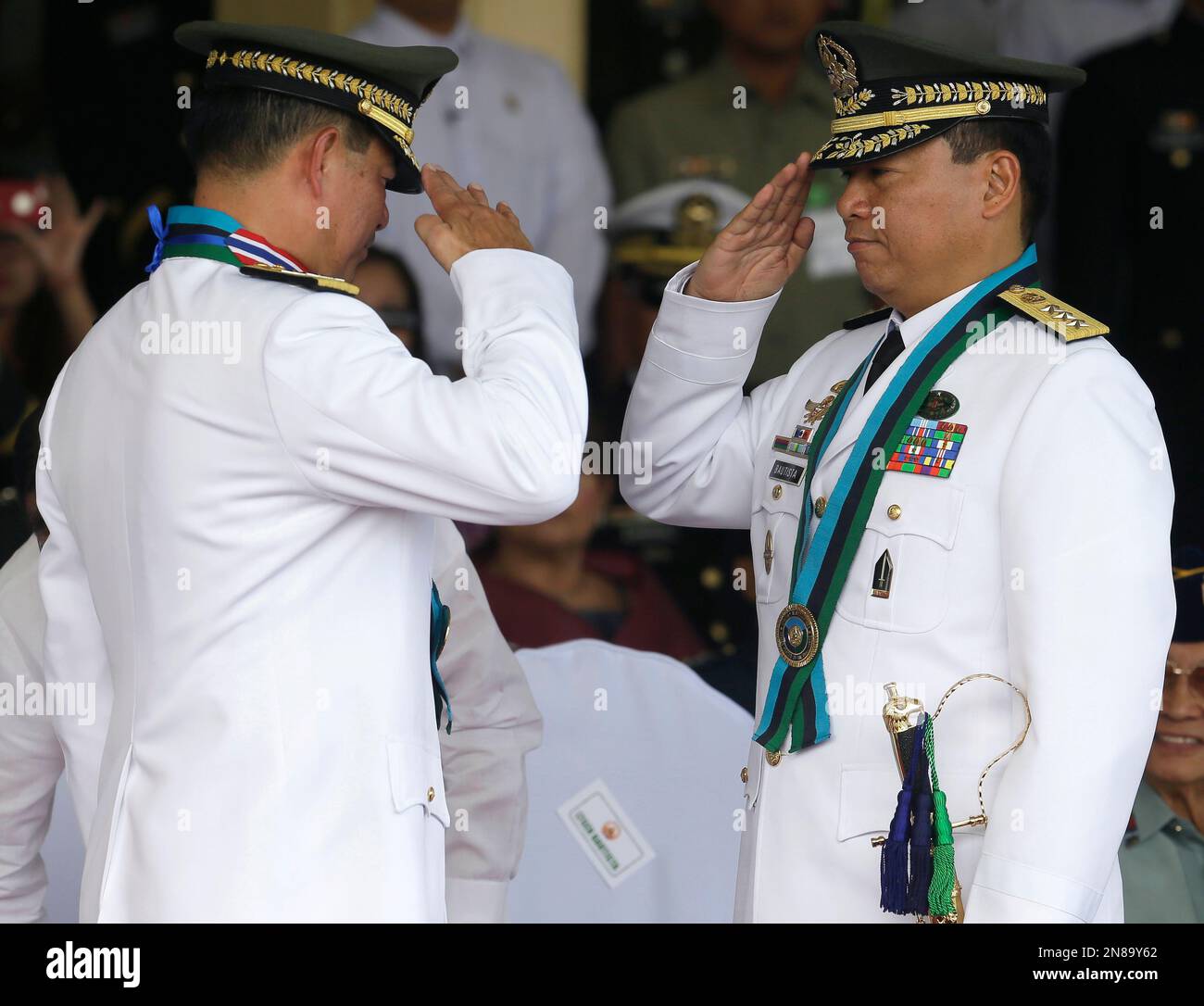 New Philippine Armed Forces Chief Gen. Emmanuel Bautista, right, and ...