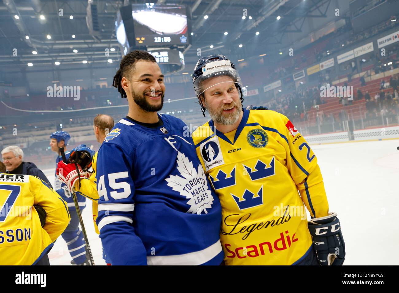 Sweden's Peter Forsberg (R) and Torontos Mark Fraser during the charity match "Game for Borje ...